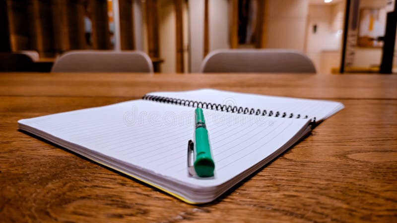 Open Lined Notebook and Ballpoint Pen on Wooden Table for Study Concept ...