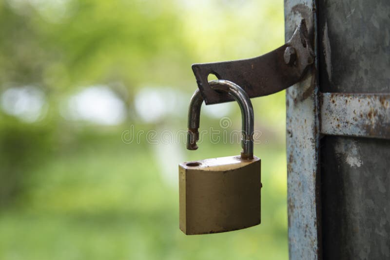 Open lock on garden door stock photo. Image of entrance - 217900572