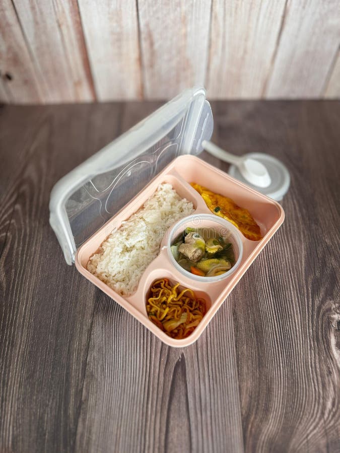Open Lunch Box with a Complete Meal Stock Photo - Image of fish ...