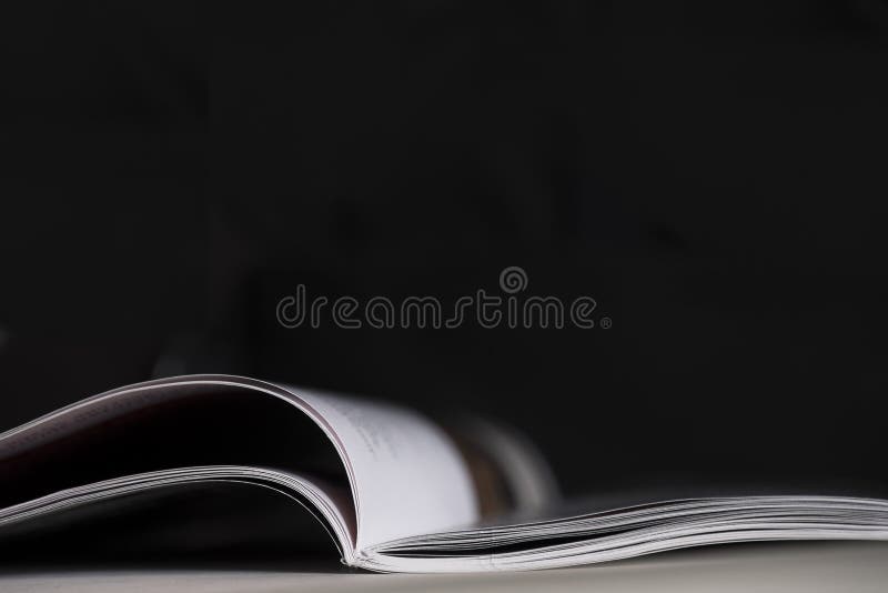 Open Magazine with on Black Background Stock Image - Image of group ...