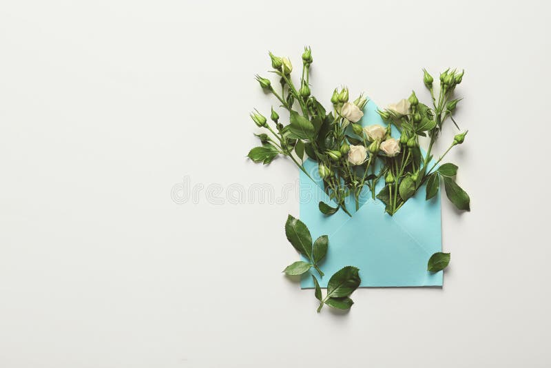 Open Mail Envelope with Rose Flowers on White Background Stock Photo ...
