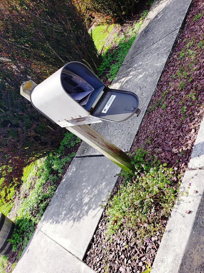 Open Mailbox on the Side of the Road Filled with Mail and Letters Stock ...