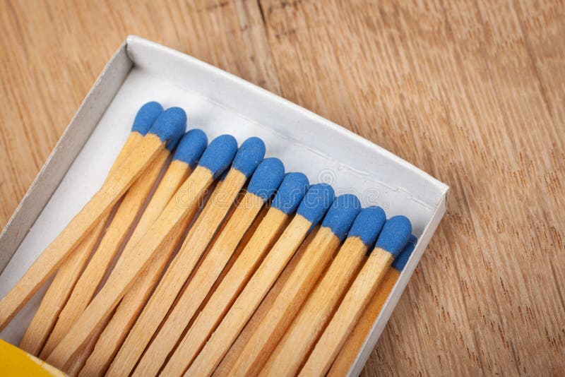 Open Matchbox, Full of Matches with Blue Heads. Wooden Background Stock ...