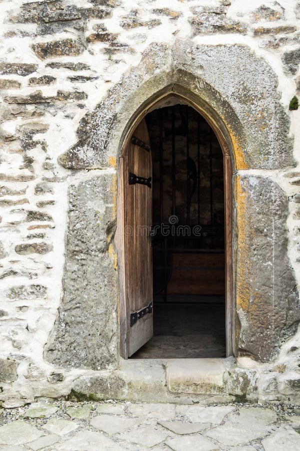 Open medieval door. stock image. Image of building, detail - 218735509