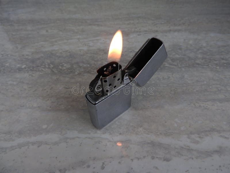 Open lighter in hand. stock image. Image of hold, reflection - 26123957