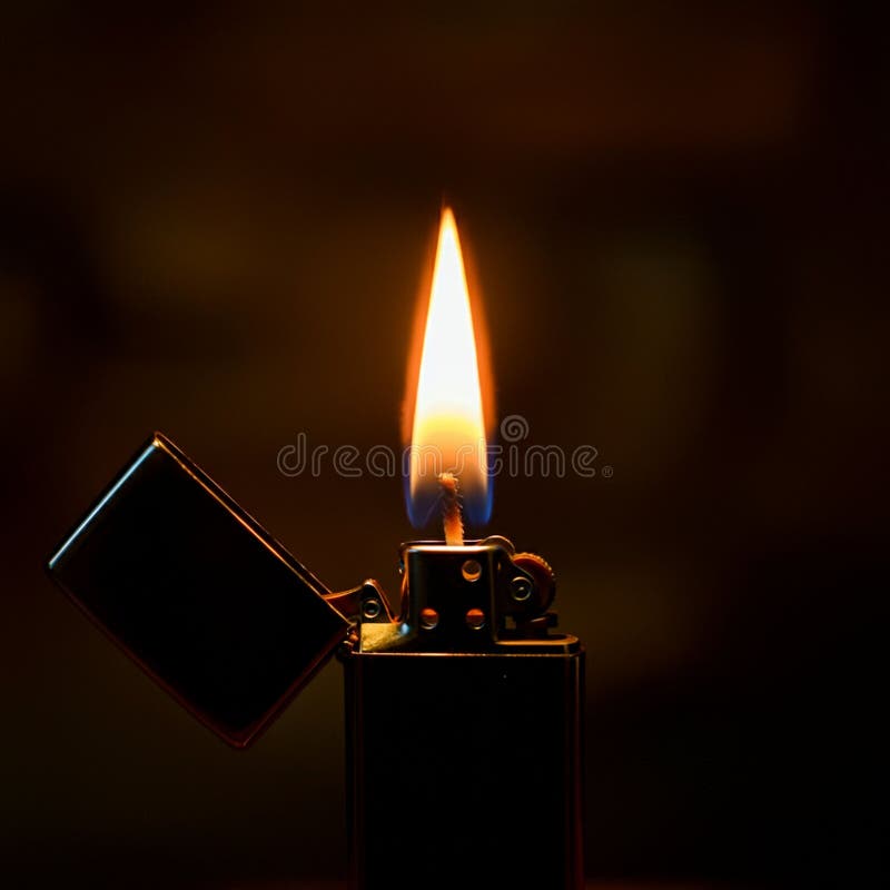 An Open Metal Lighter with Its Lid Flipped Back, Displaying an Orange ...