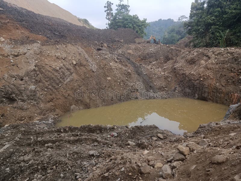 Open Mine with Standing Water in the Mining Area Stock Photo - Image of ...