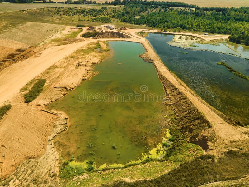 Open Mining of Constructing Sand from Illuminated Quarry Stock Photo ...