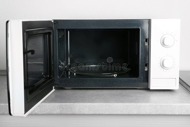 Open Modern Microwave Oven on Table Stock Image - Image of modern, door ...