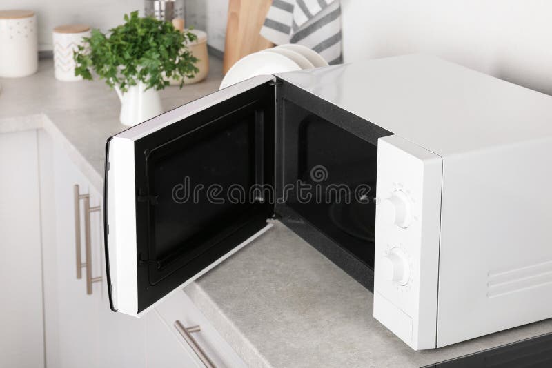 Open Modern Microwave Oven on Table Stock Photo - Image of device, food ...