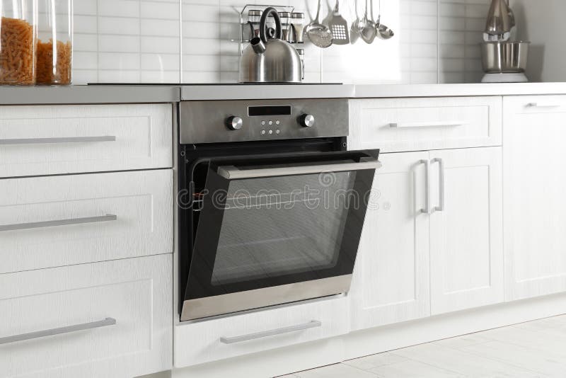 Open modern oven built stock photo. Image of house, cabinet - 131631138