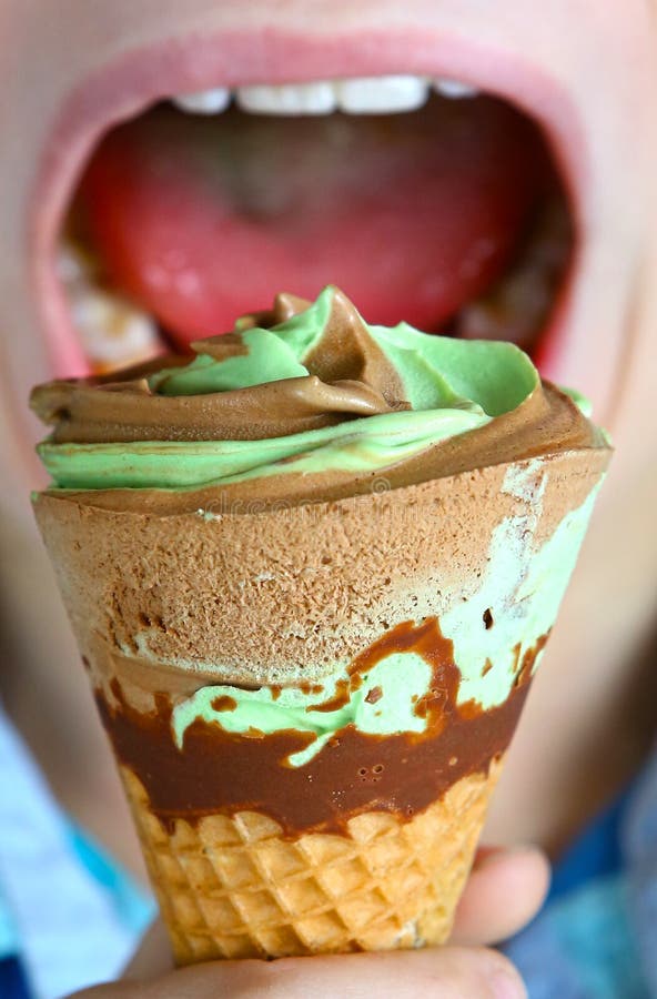 Open Mouth with Pistachio Chocolate Icecream Cone Stock Image - Image ...