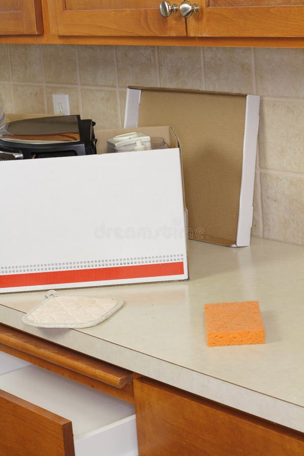 Open Moving Box on Kitchen Counter Stock Image - Image of vertical ...