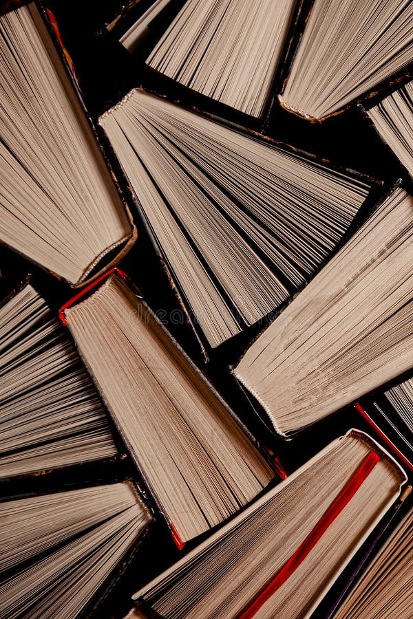 Open Multi-colored Old Books Stand on a Bookshelf in the Home Library ...