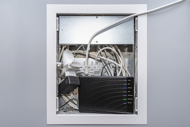 An Open Multimedia Box with an Internet Modem and Antenna Cables ...