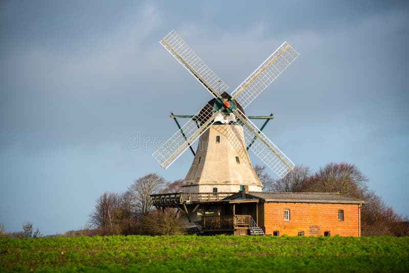 In the Open Nature in a Field Stands a Windmill Stock Photo - Image of ...