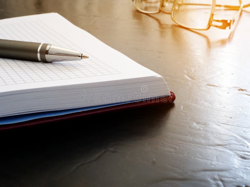 Open Note Pad with Pen and Glasses. Reminder on the Desk Stock Photo ...