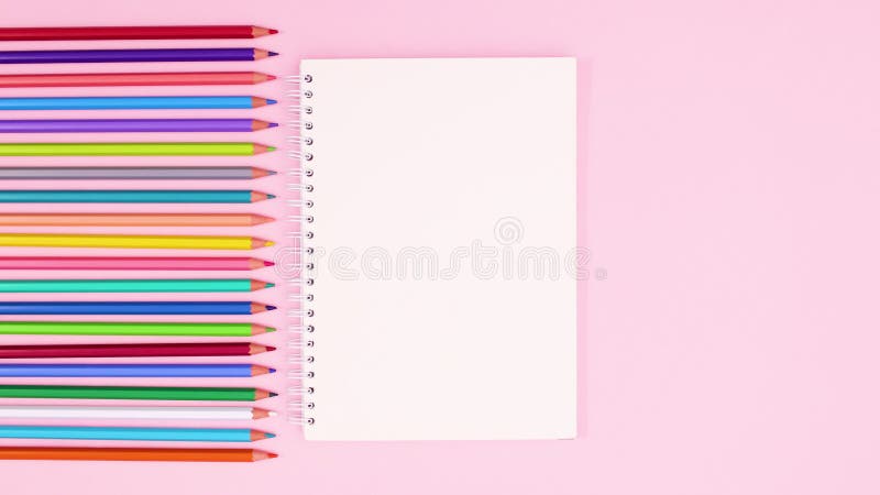 Open Notebook Appear Next To Pastel Colored Pencils. Stop Motion Stock ...