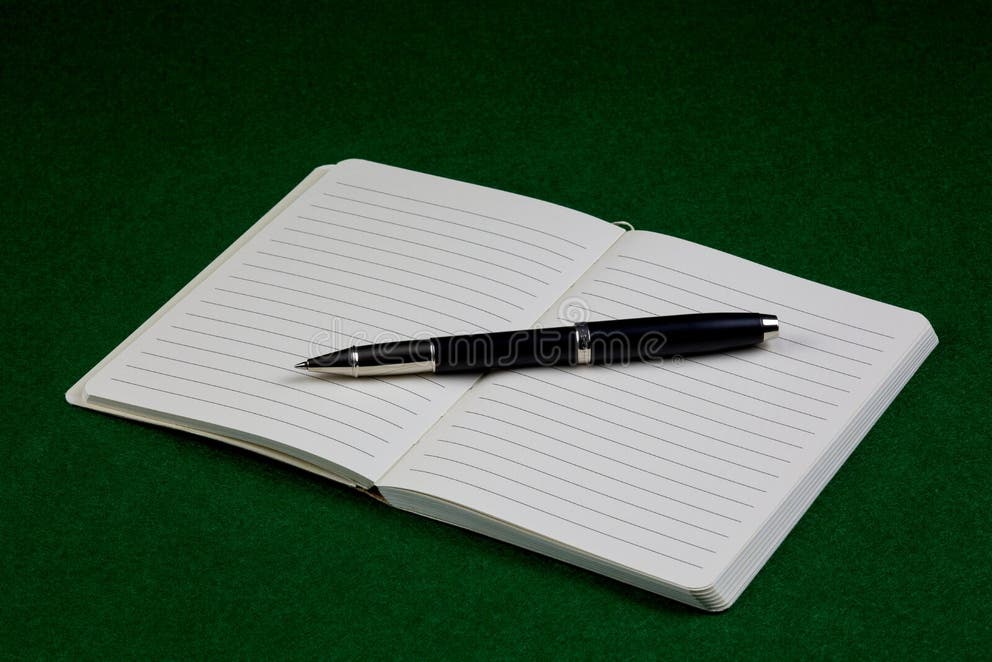 Open Notebook with Black Rollerball Pen on a Felt Table Top Stock Image ...