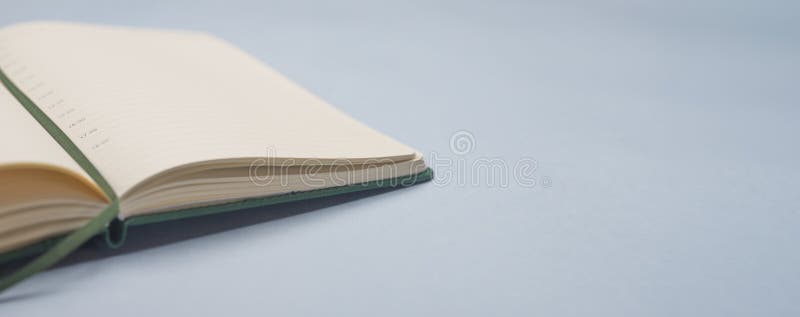 Open Notebook on Blue Office Desk, Side View, Close Up Stock Image ...