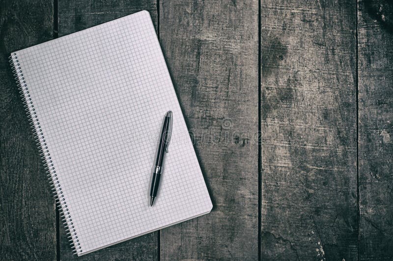 Open Notebook into the Cell, Clean Sheets Lying on a Wooden Surf Stock ...