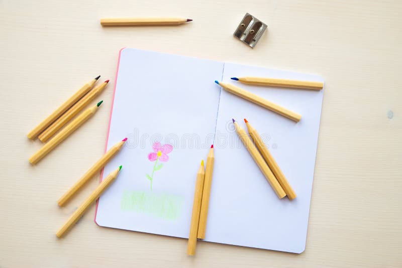 Open Notebook, with Colored Crayons and Drawing Stock Photo - Image of ...