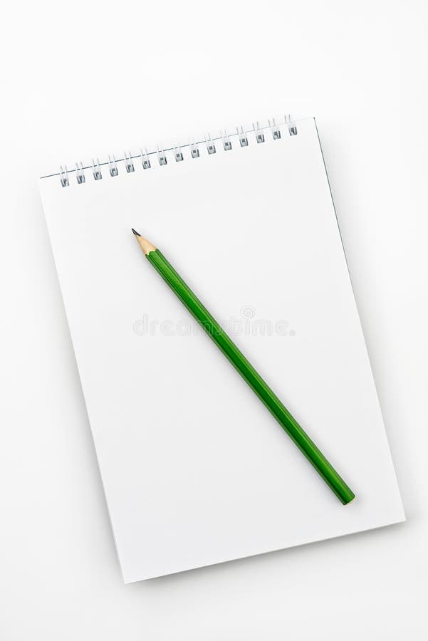 Open Notebook with Green Graphite Pencil on White Stock Photo - Image ...