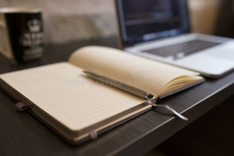 Open notebook and laptop stock photo. Image of indoors - 81267382