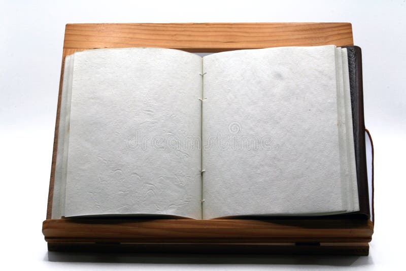 Open notebook on lectern stock photo. Image of document - 209695166