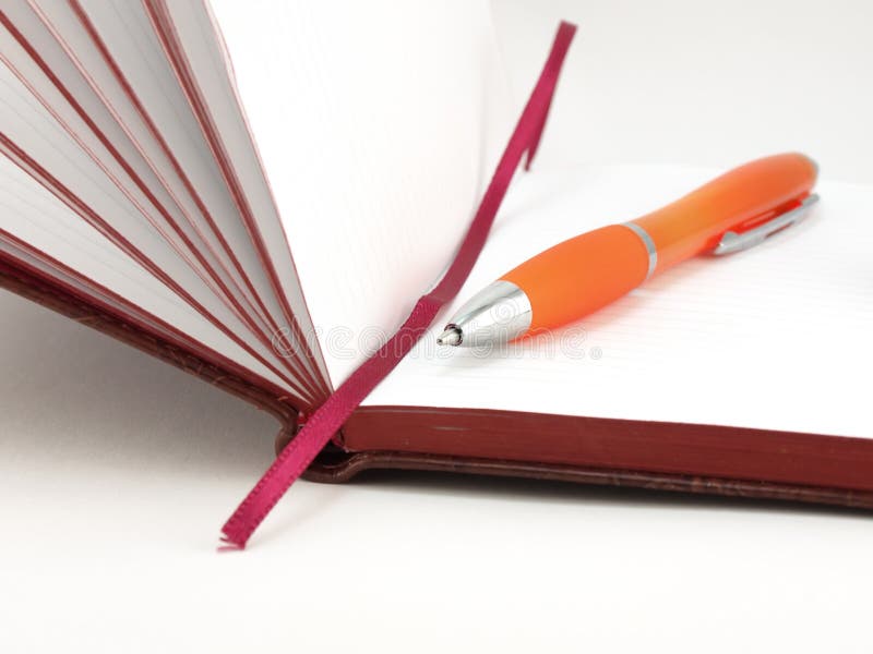 Open notebook and pen stock photo. Image of orange, blank - 13264388
