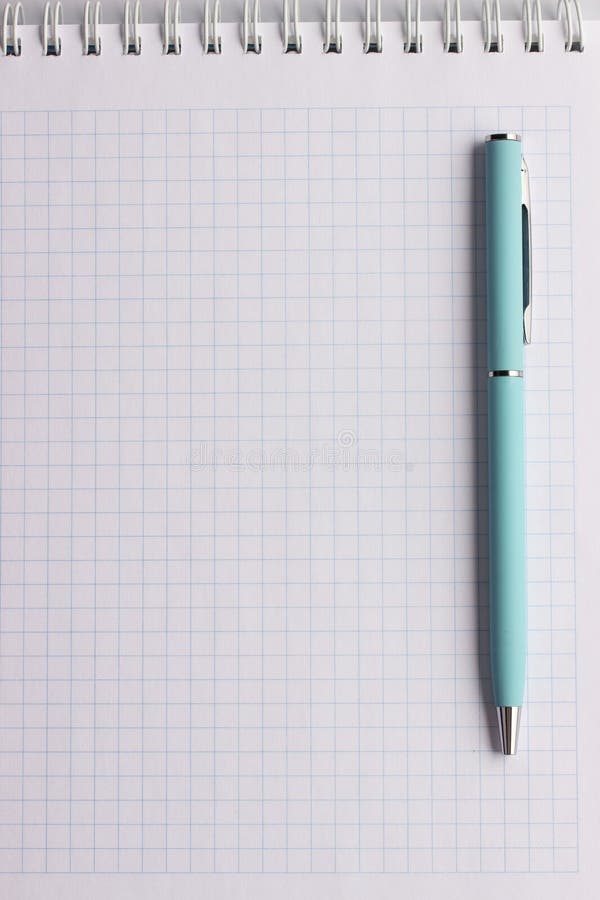 An Open Notebook with a Pen and Checkered Leaves with a Place for Text ...