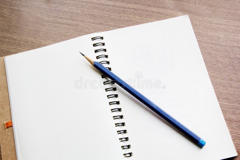 Open notebook with pencil stock image. Image of days - 39136571