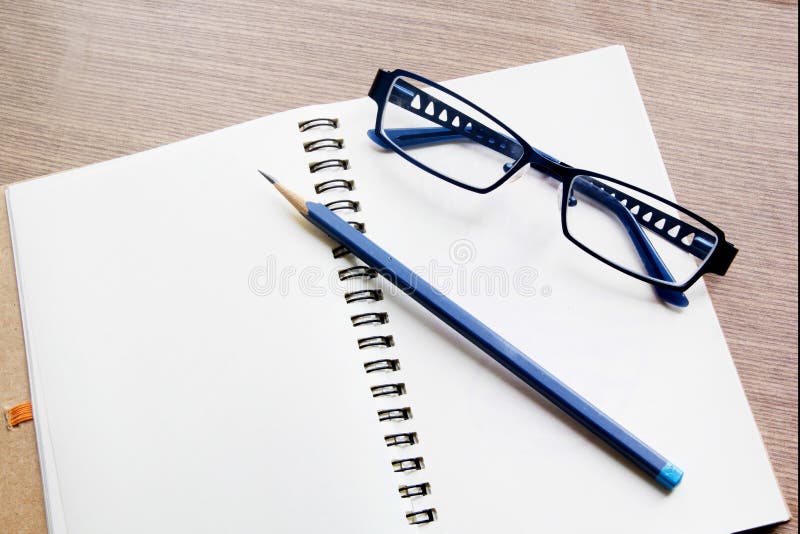 Open Notebook with Pencil and Glasses Stock Image - Image of ...