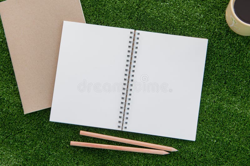 Open Notebook and Pencil on Grass Field Stock Photo - Image of design ...