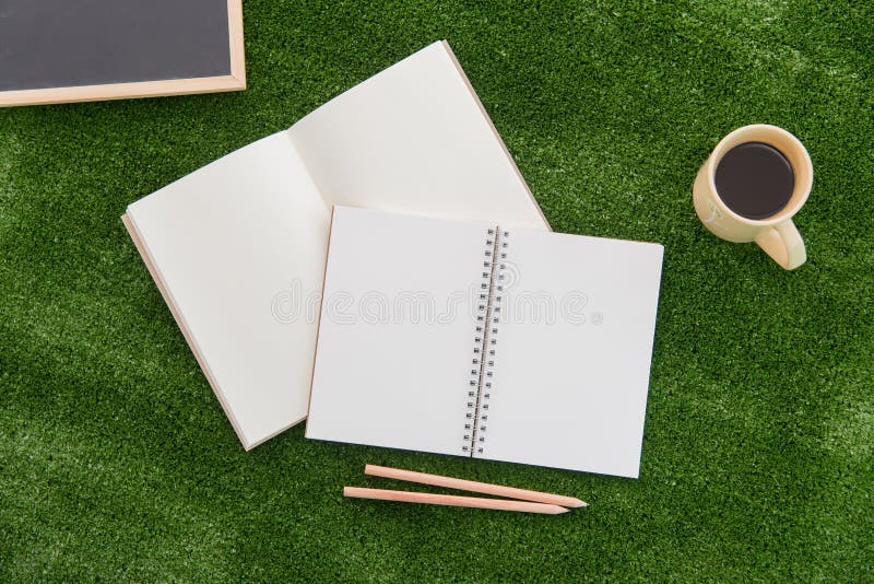 Open Notebook and Pencil on Grass Field Stock Photo - Image of cover ...
