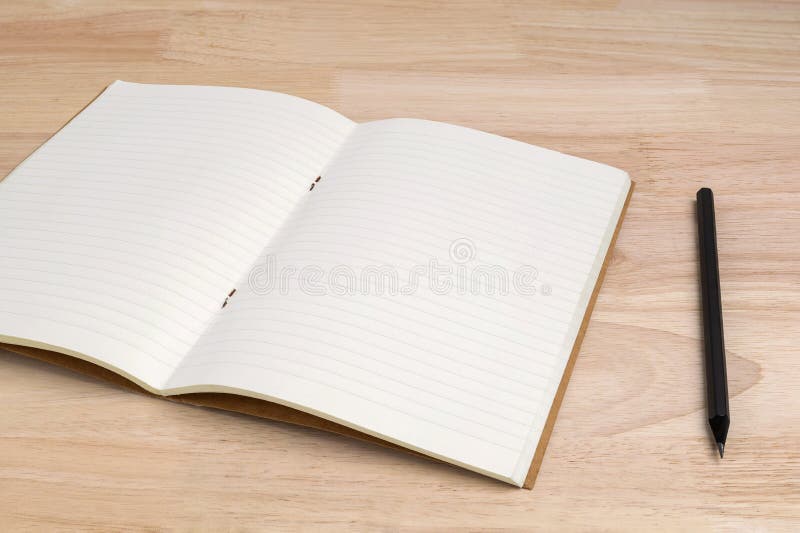 Open Notebook with Pencil on Wooden Table for Mockup Stock Photo ...