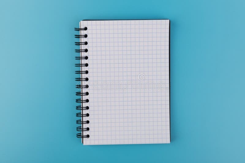 The Open Notebook on a Spiral. Blank Pages in Checkered Notebook on ...