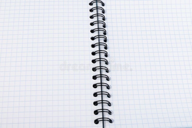 The Open Notebook on a Spiral. Blank Pages in Checkered Notebook on ...