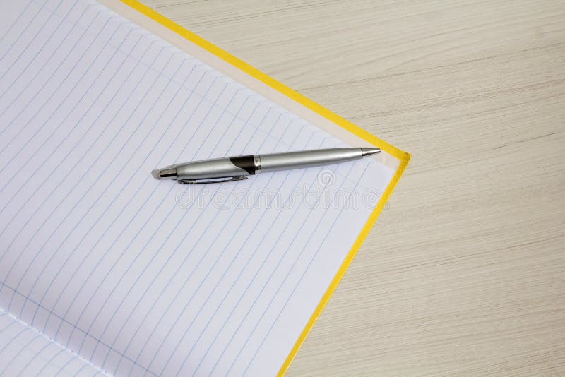 Open Notebook on the Table with Pen and Notepad Stock Photo - Image of ...