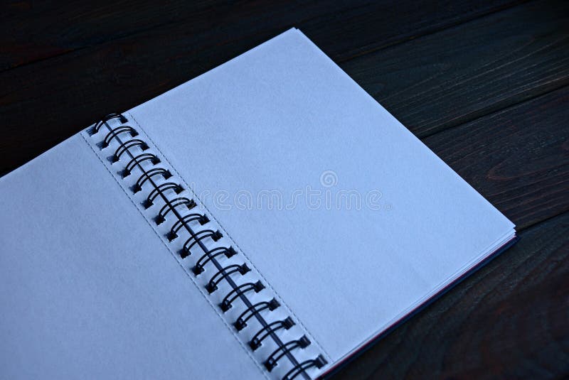 Open Notebook with White Pages on a Black Table Stock Image - Image of ...