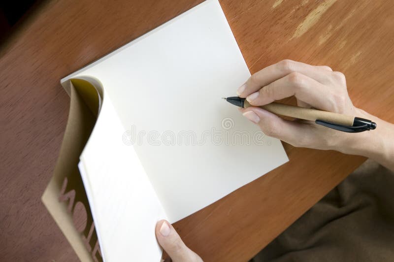 Lady Writing In Notebook Picture. Image: 2461016