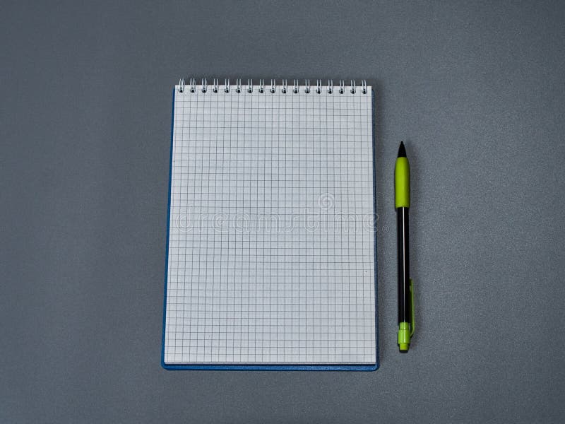 Open Notepad in a Cage with a Mechanical Pencil Stock Photo - Image of ...