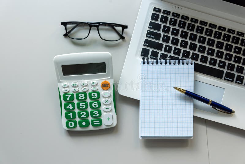 Open Notepad for Notes with Pen Laptop and Calculator on Office White ...