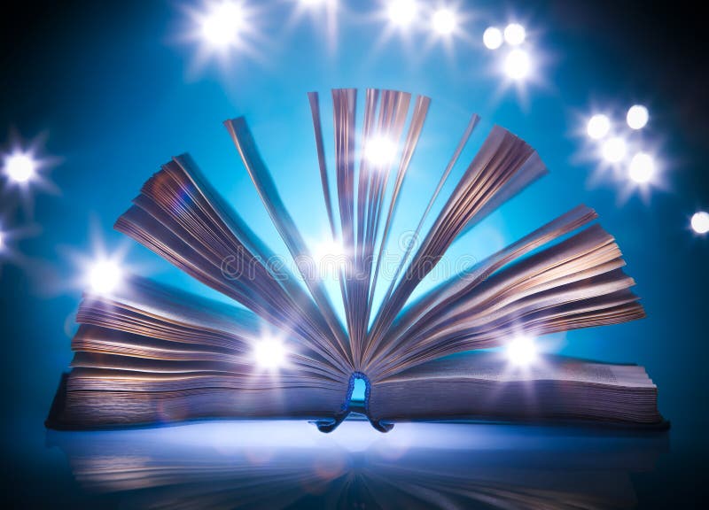 Open Old Book, Mystical Blue Light at Background Stock Photo - Image of ...