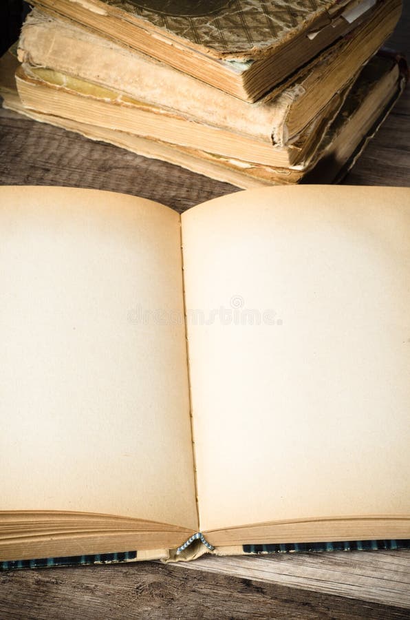 Open Old Book on a Wooden Surface Stock Image - Image of library, copy ...
