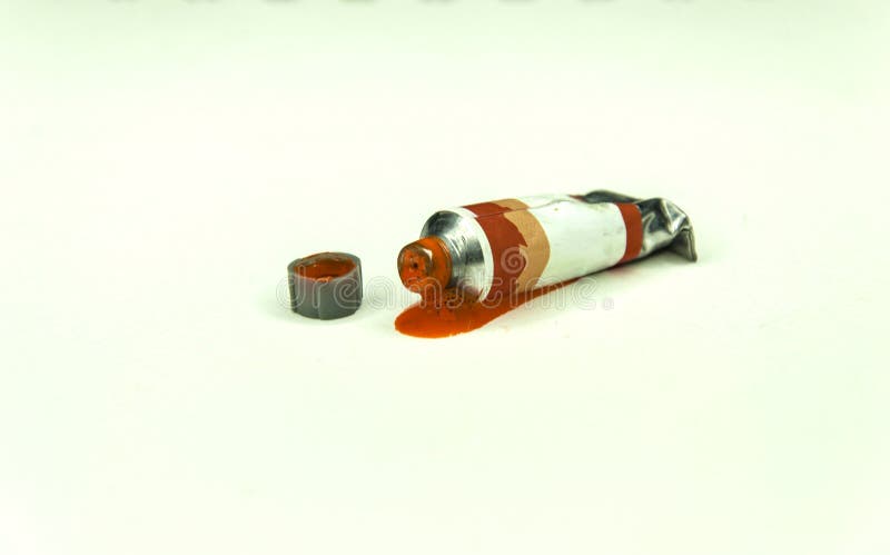 Open Orange Paint Tube on White Background Stock Image - Image of ...