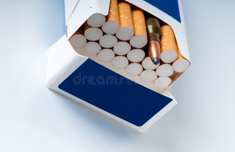 Open Pack of Cigarettes with a Weapon Cartridge Stock Image - Image of ...