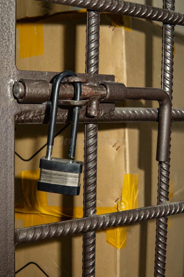 Open padlock on the cage stock photo. Image of safety - 220065896