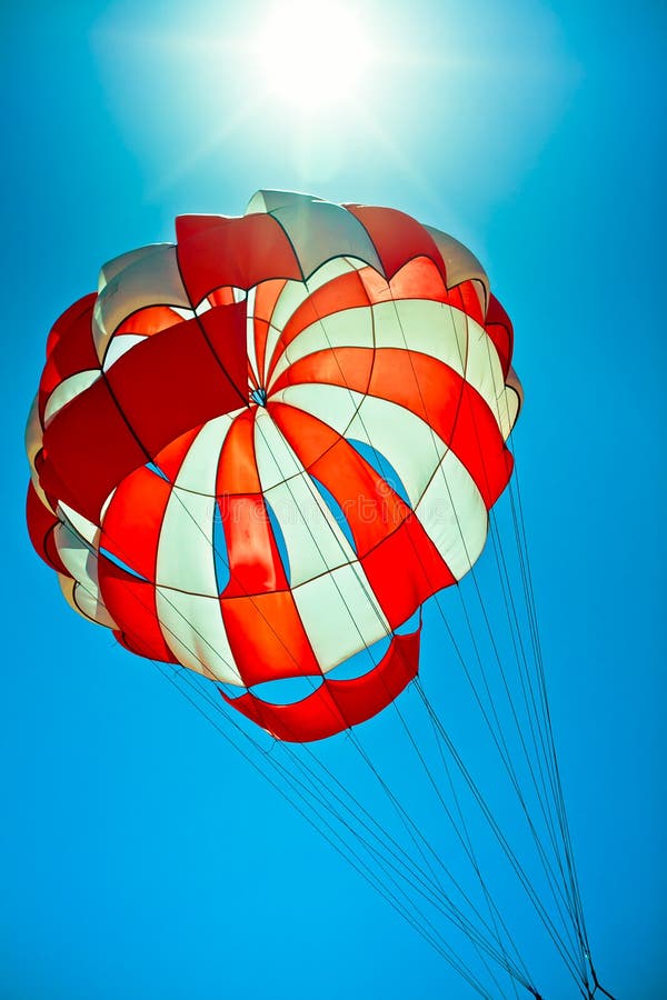 Parachute in blue stock image. Image of holiday, people - 25572571