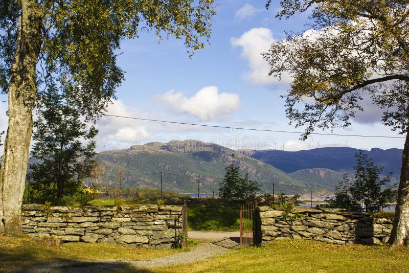 Open Park Gate, with Mountains and Sea on the Background Stock Photo ...